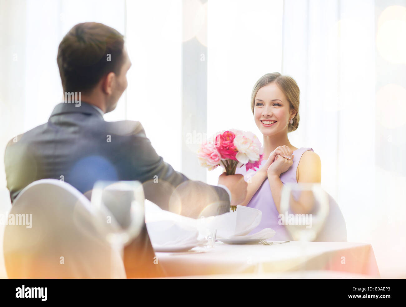 Woman receive flowers hi-res stock photography and images - Alamy