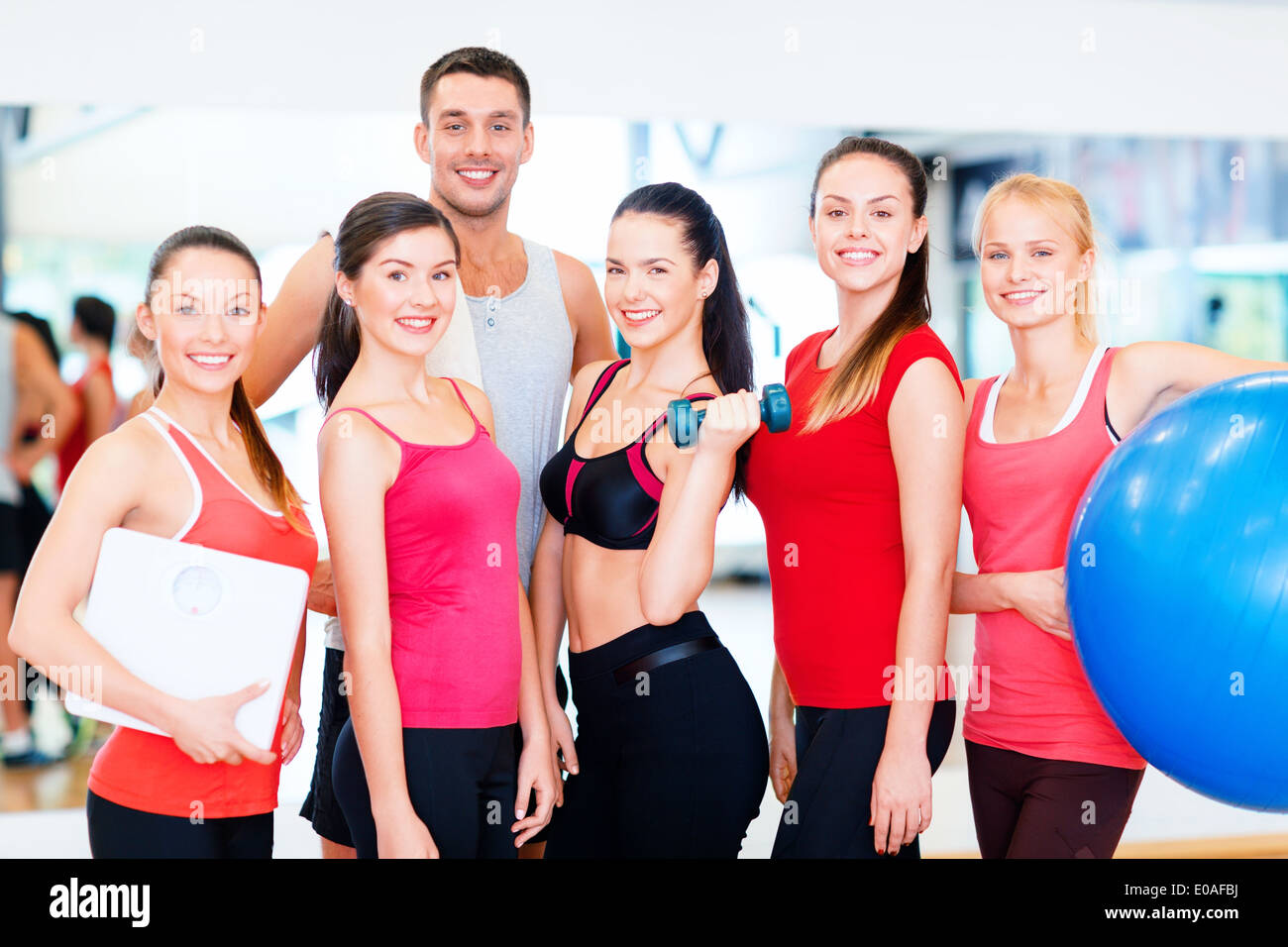 group of smiling people in the gym Stock Photo - Alamy
