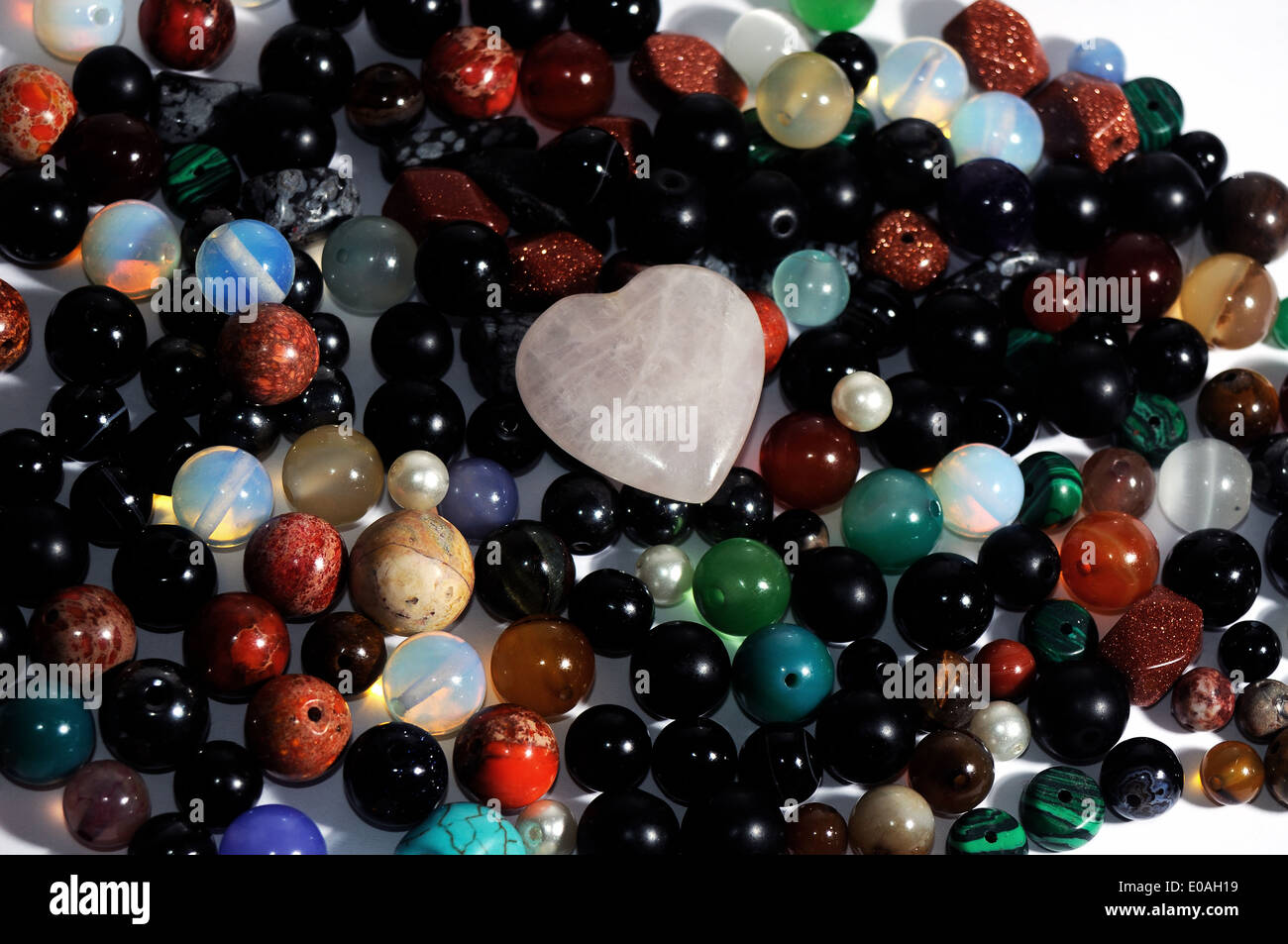 Mix of colorful polished gemstones balls on the white background Stock ...