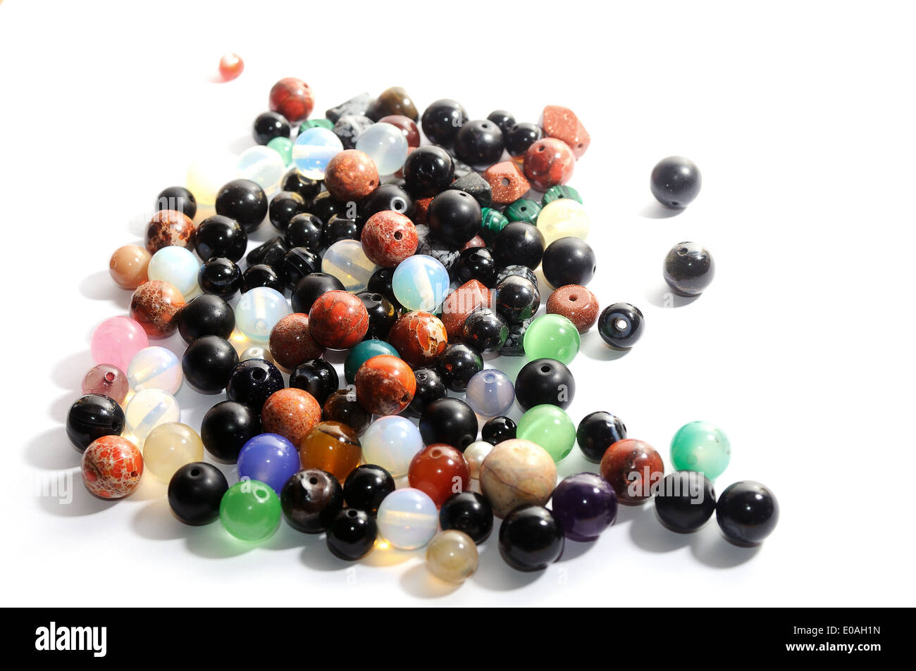 Mix of colorful polished gemstones balls on the white background Stock ...