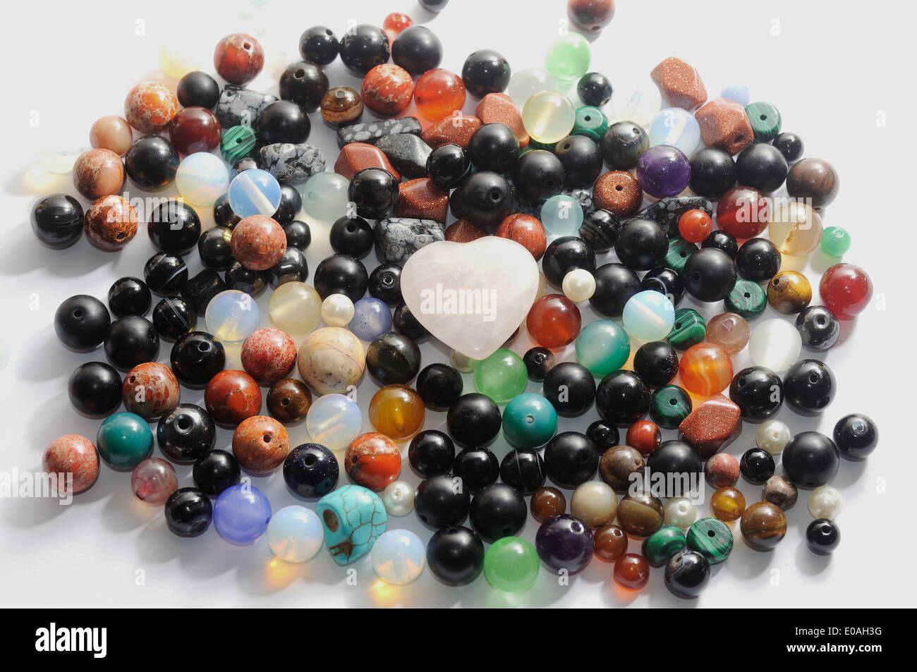 Mix of colorful polished gemstones balls on the white background Stock ...
