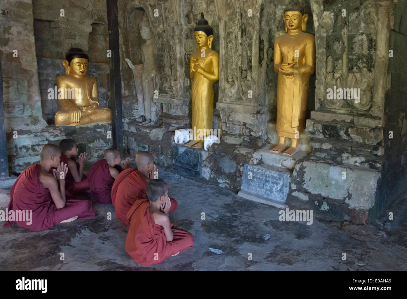Praying inside temple hi-res stock photography and images - Alamy