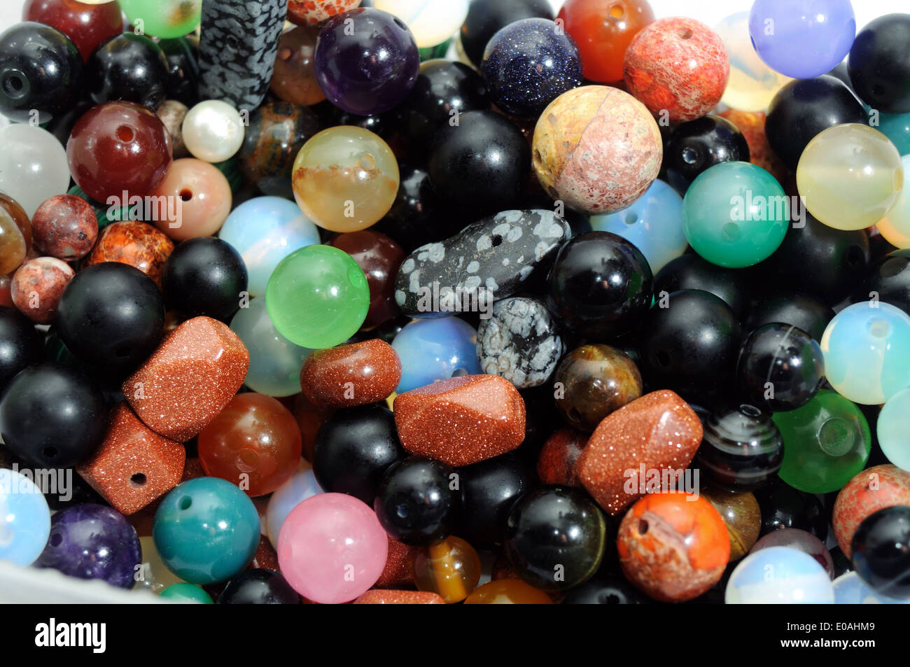 Mix of colorful polished gemstones balls on the white background Stock ...