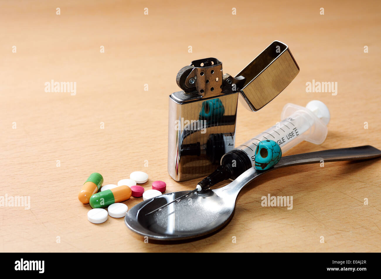 syringe, spoon,pills,skull and lighter on the floor Stock Photo - Alamy