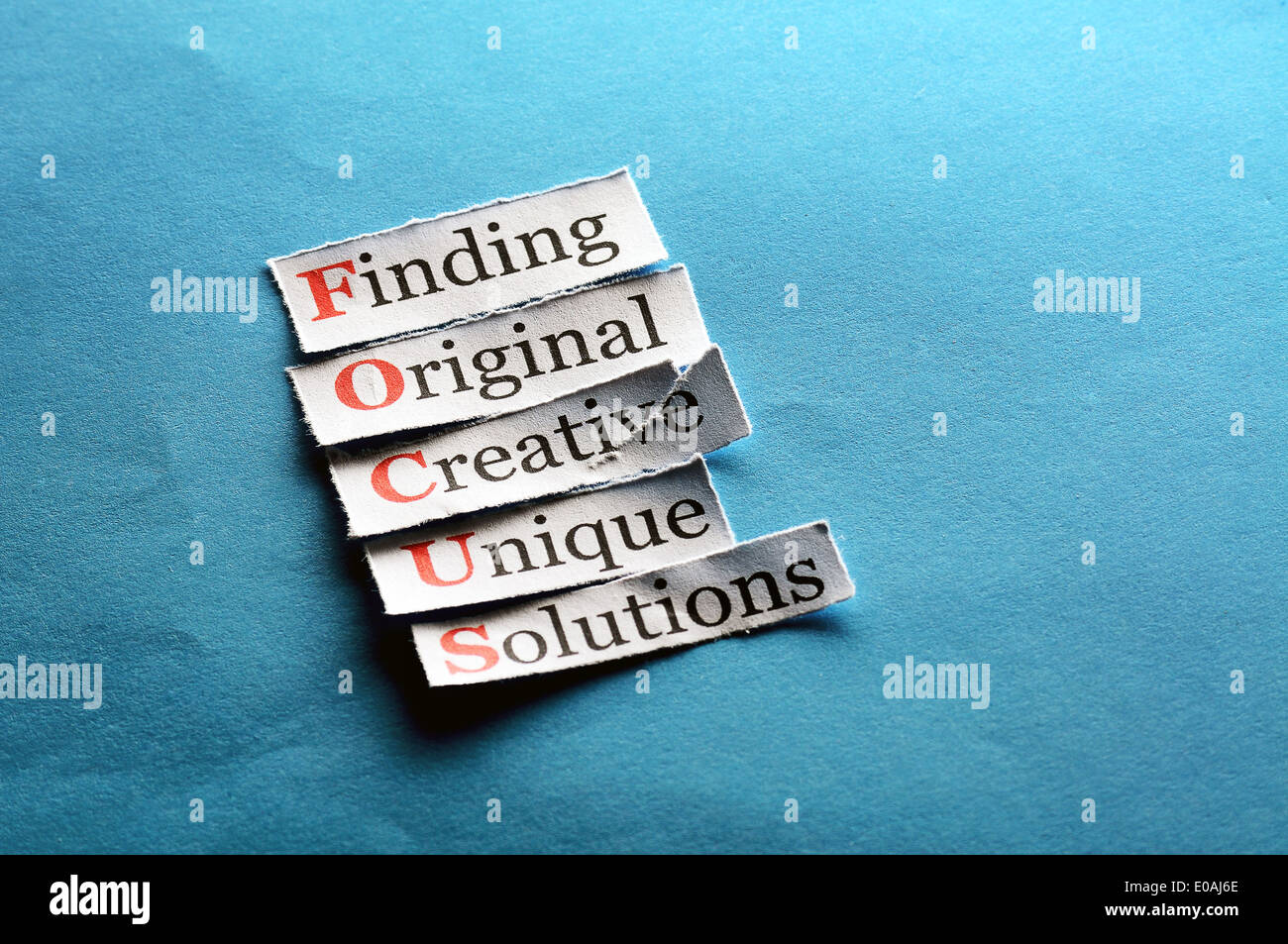 Focus acronym in business concept, words on cut paper hard light Stock ...