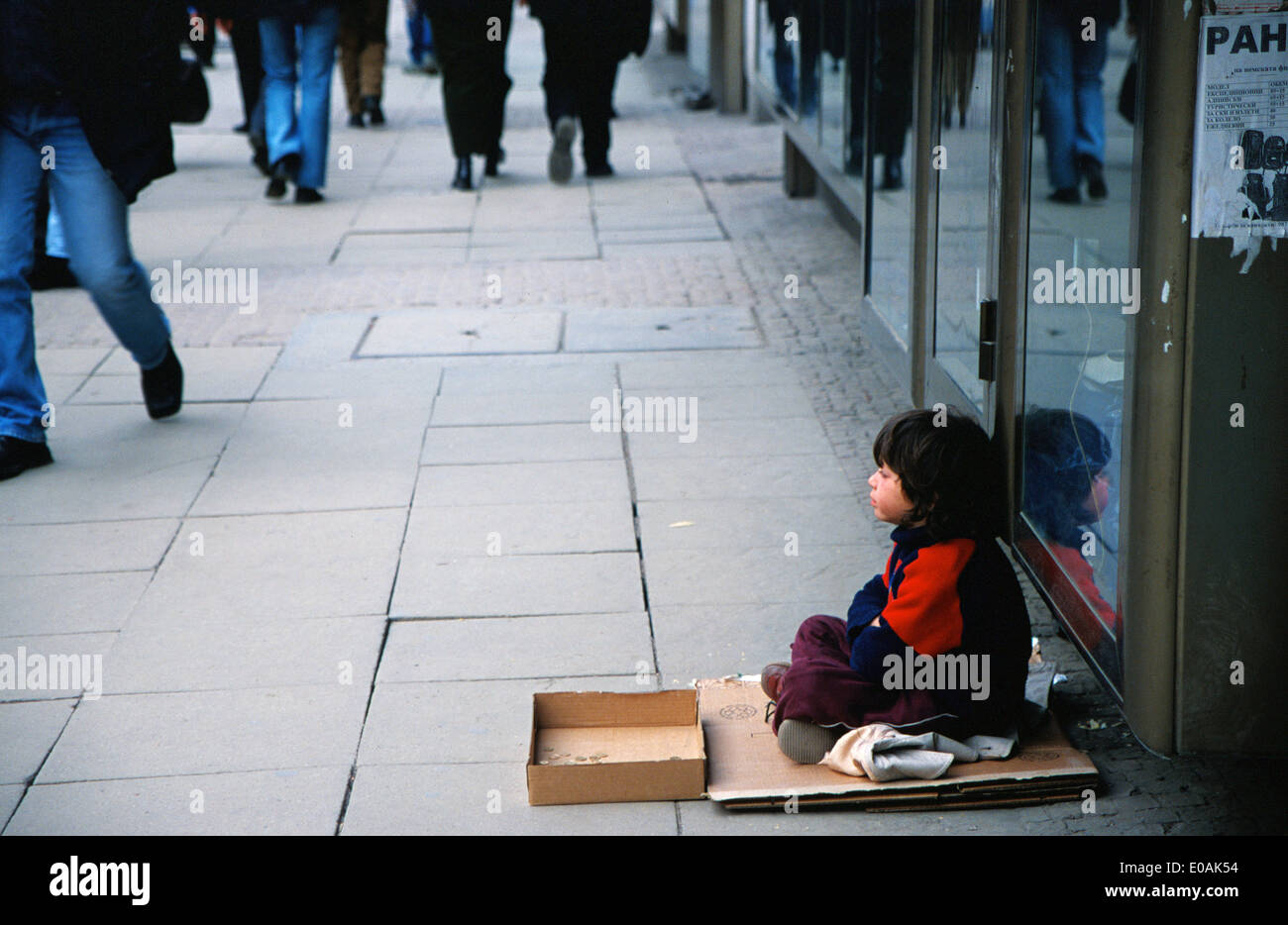 Child begging in streets hi-res stock photography and images - Alamy
