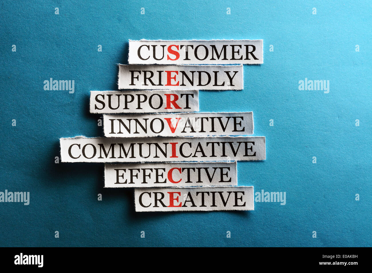 Service acronym in business concept, words on cut paper hard light ...