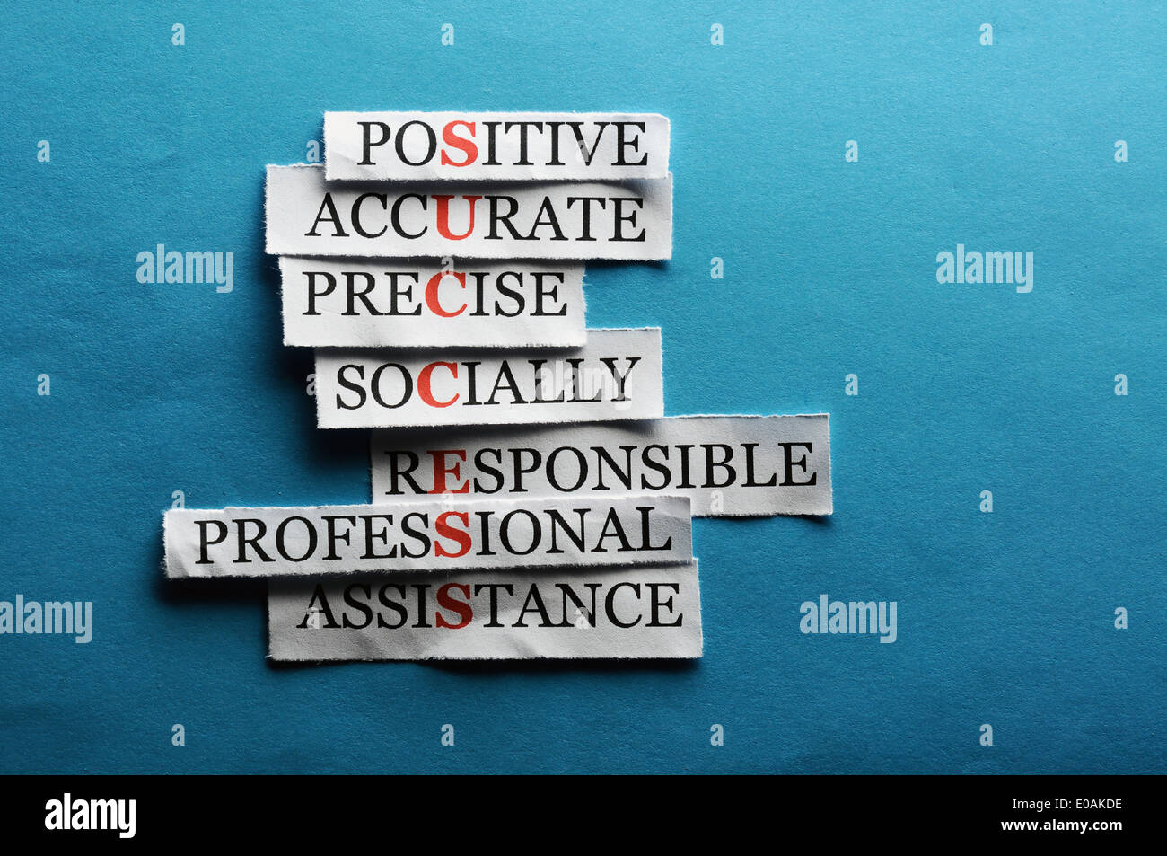 Success acronym in business concept, words on cut paper hard light ...