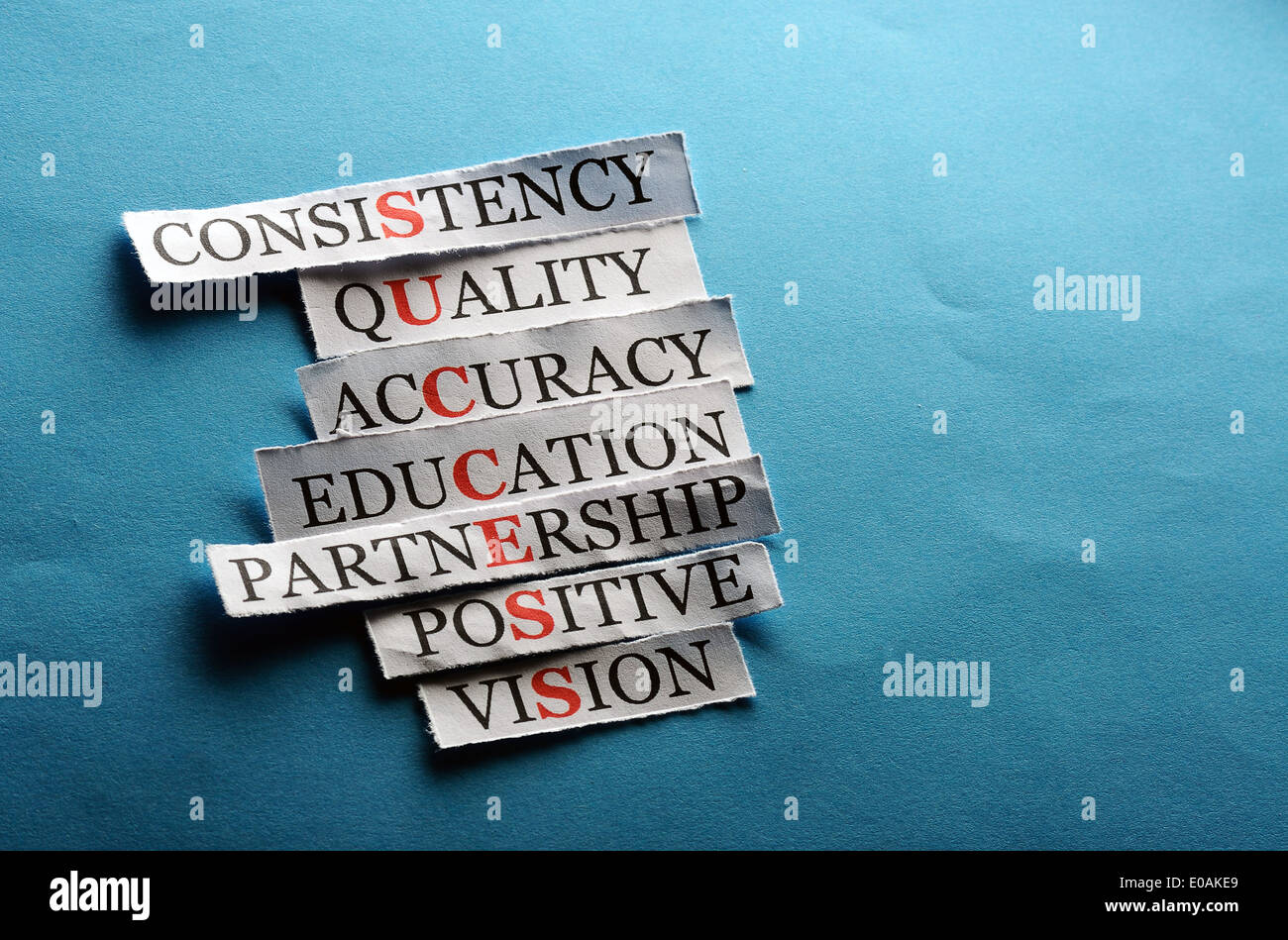 Success acronym in business concept, words on cut paper hard light ...