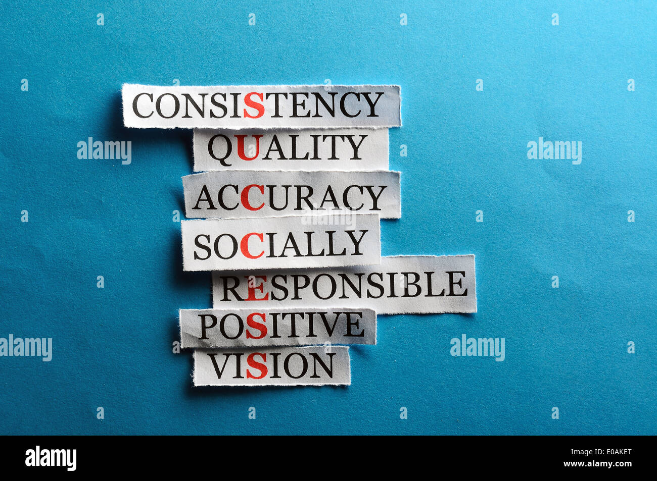 Success acronym in business concept, words on cut paper hard light ...