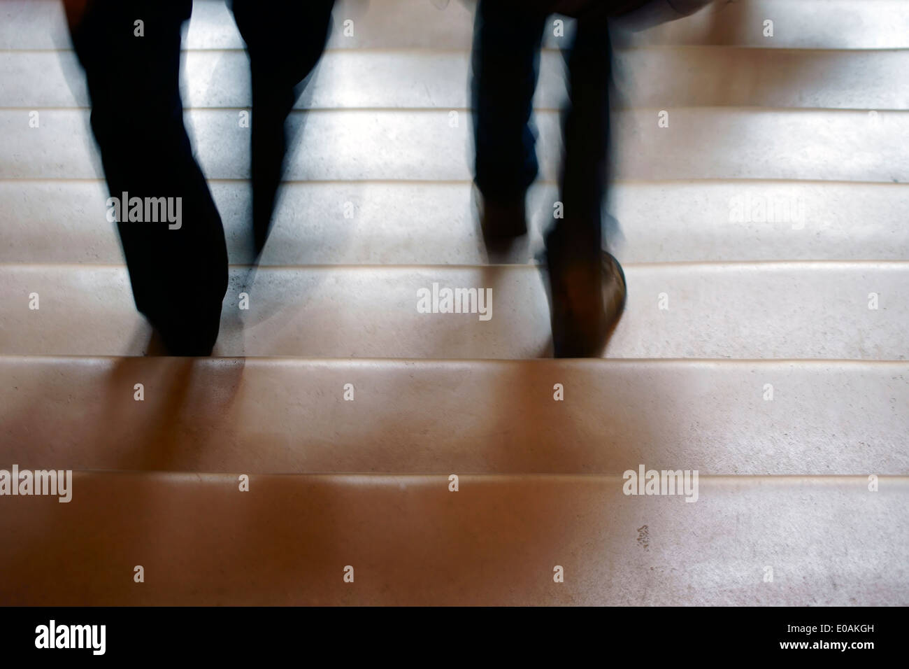 going down a staircase Stock Photo - Alamy
