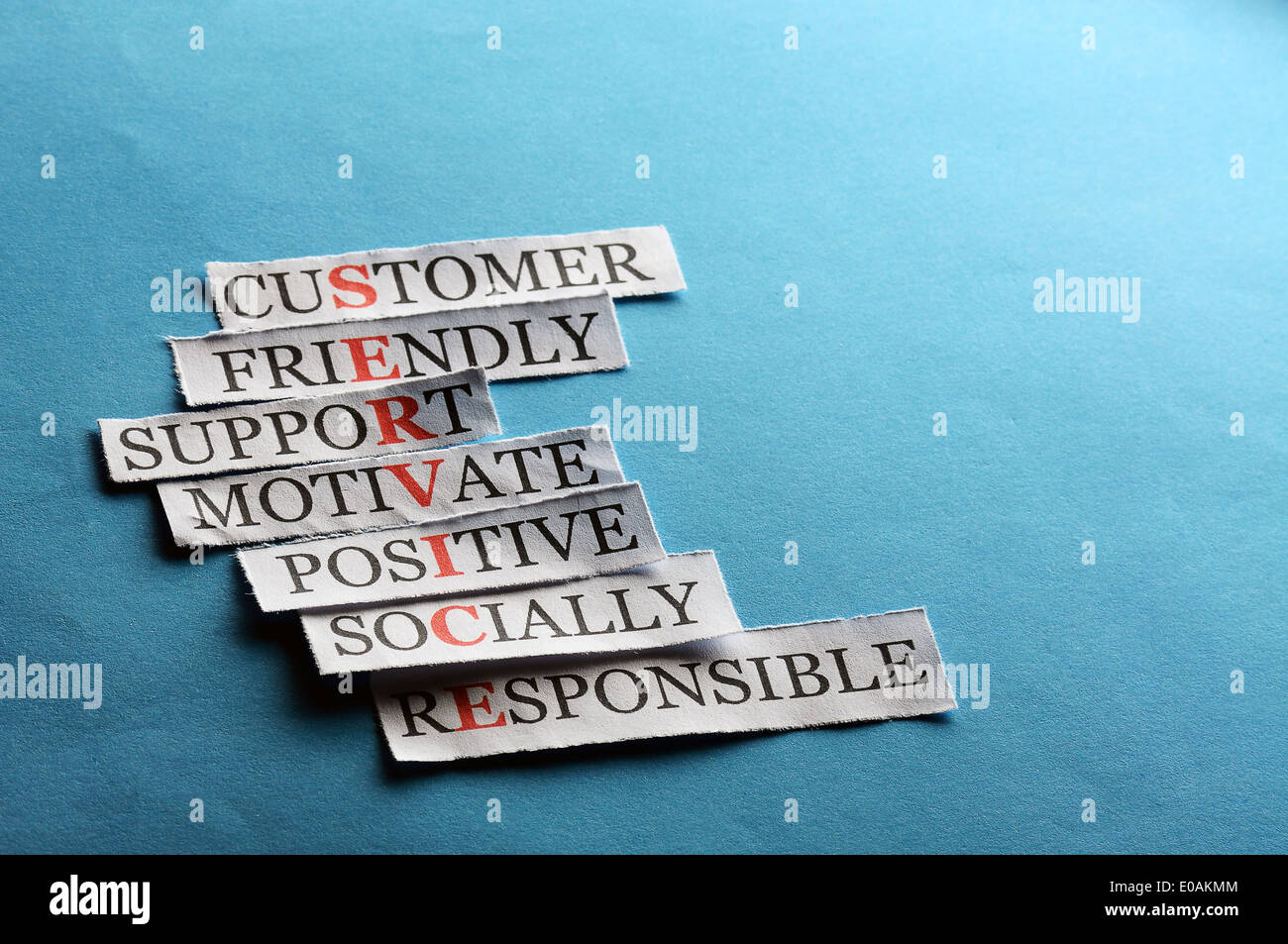 Service acronym in business concept, words on cut paper hard light ...