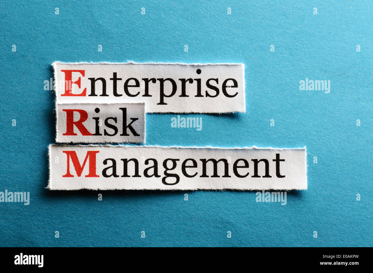 acronym erm - enterprise risk management on blue paper Stock Photo - Alamy
