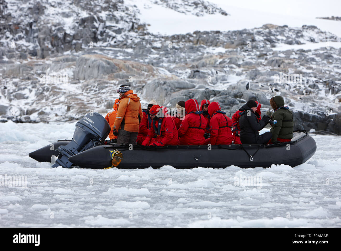 tourists on zodiac excursion with engine trouble going through brash ...