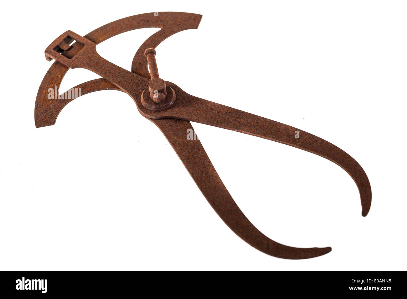an ancient and rusty caliper isolated over a white background Stock ...