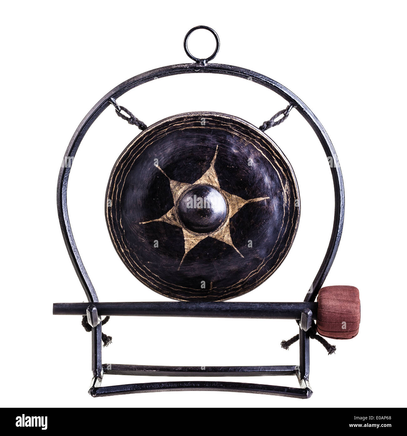 a small ancient gong isolated over a white background Stock Photo - Alamy