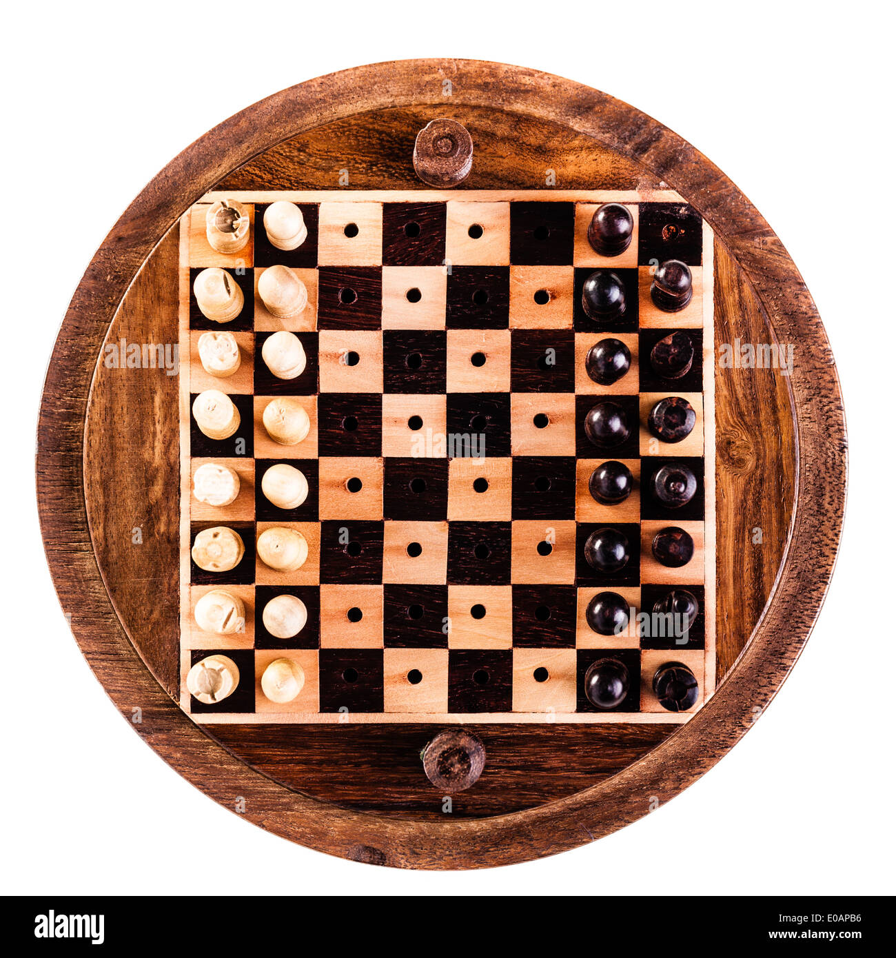 a small wooden chess board with chess pieces isolated over white Stock ...