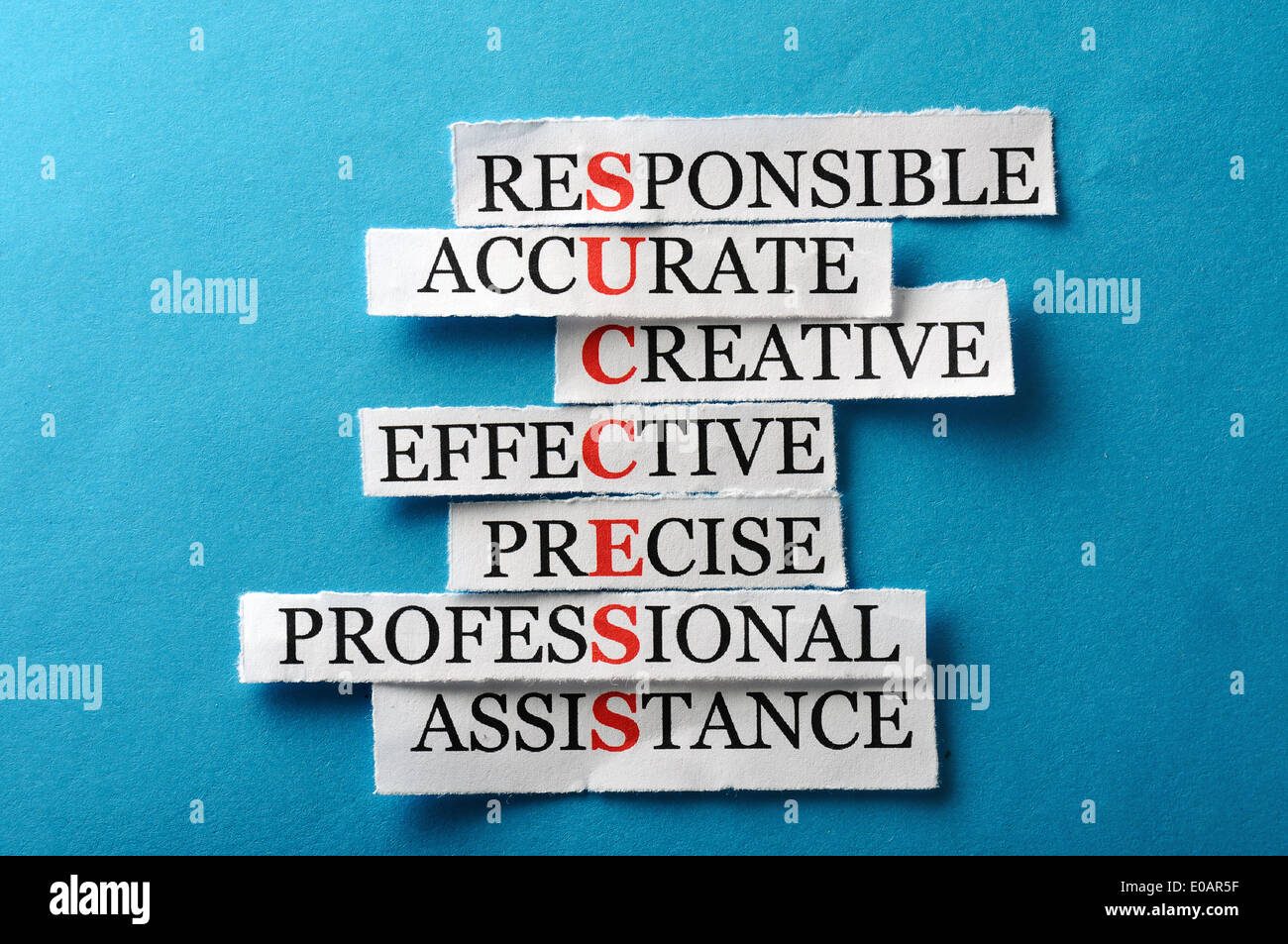 Success acronym in business concept, words on cut paper hard light ...