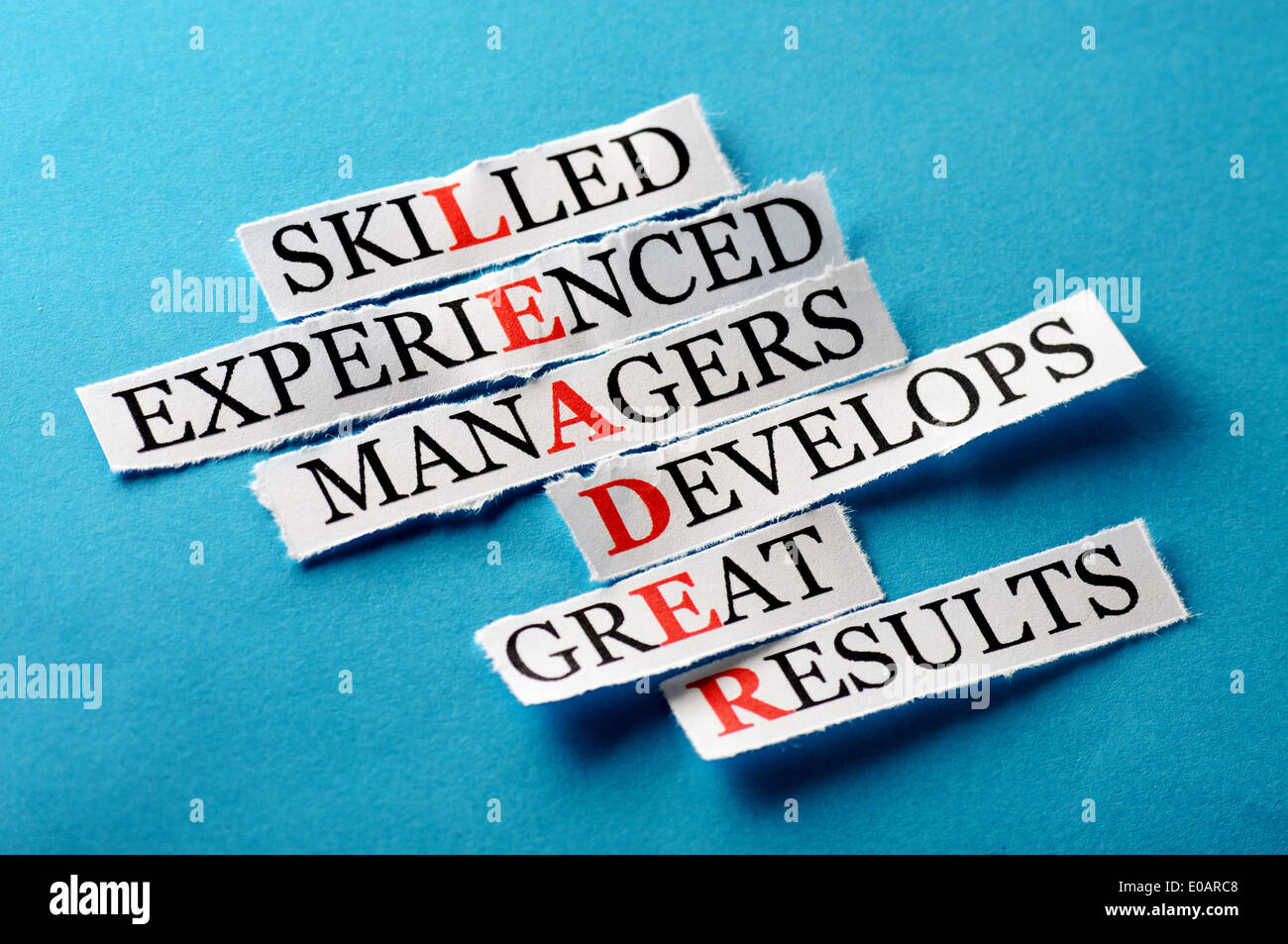 leader acronym in business concept, words on cut paper hard light Stock ...