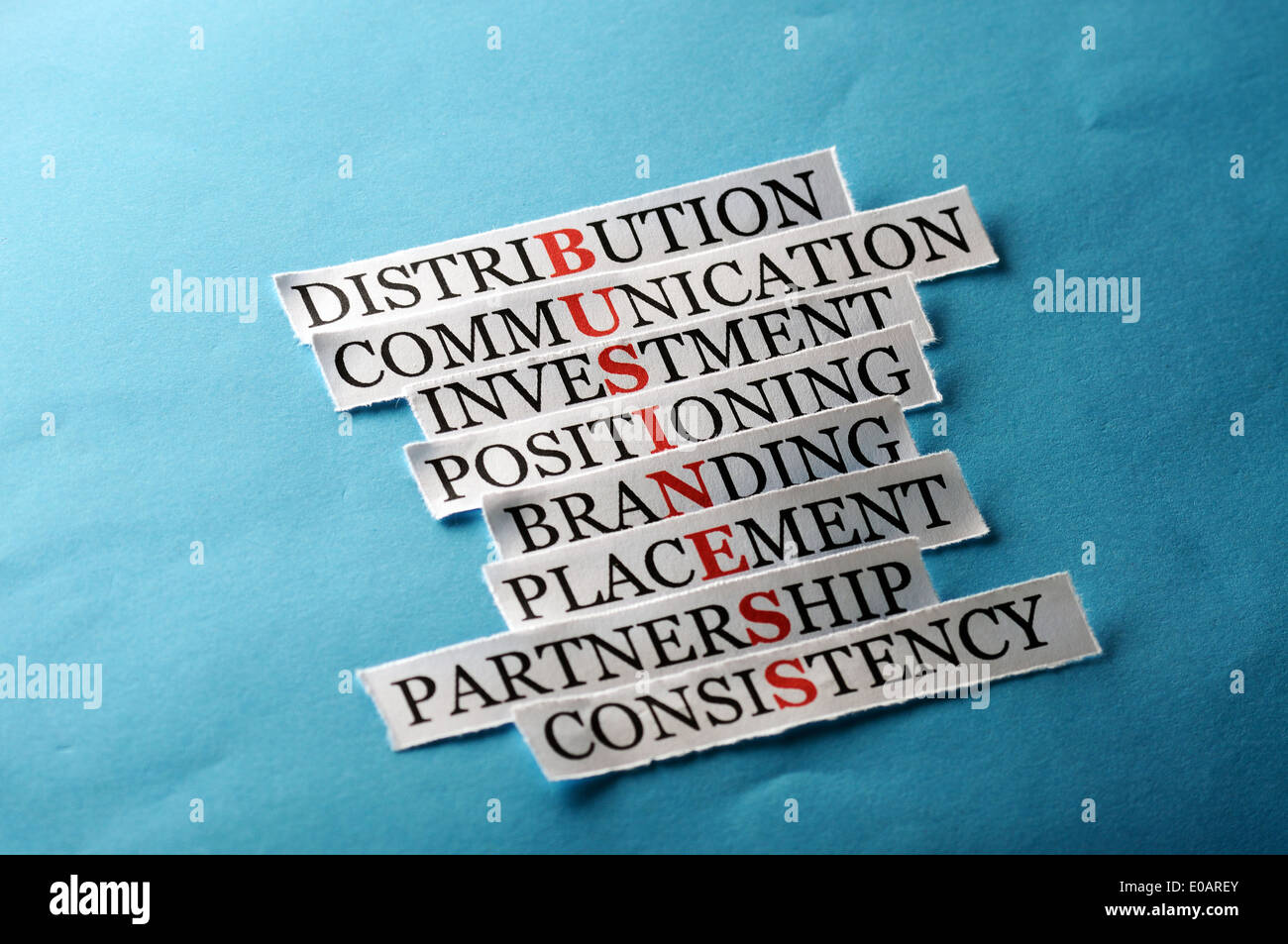 business acronym in business concept, words on cut paper hard light ...