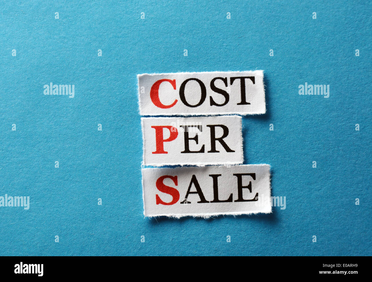 CPS cost per sale, words on cut paper hard light Stock Photo - Alamy