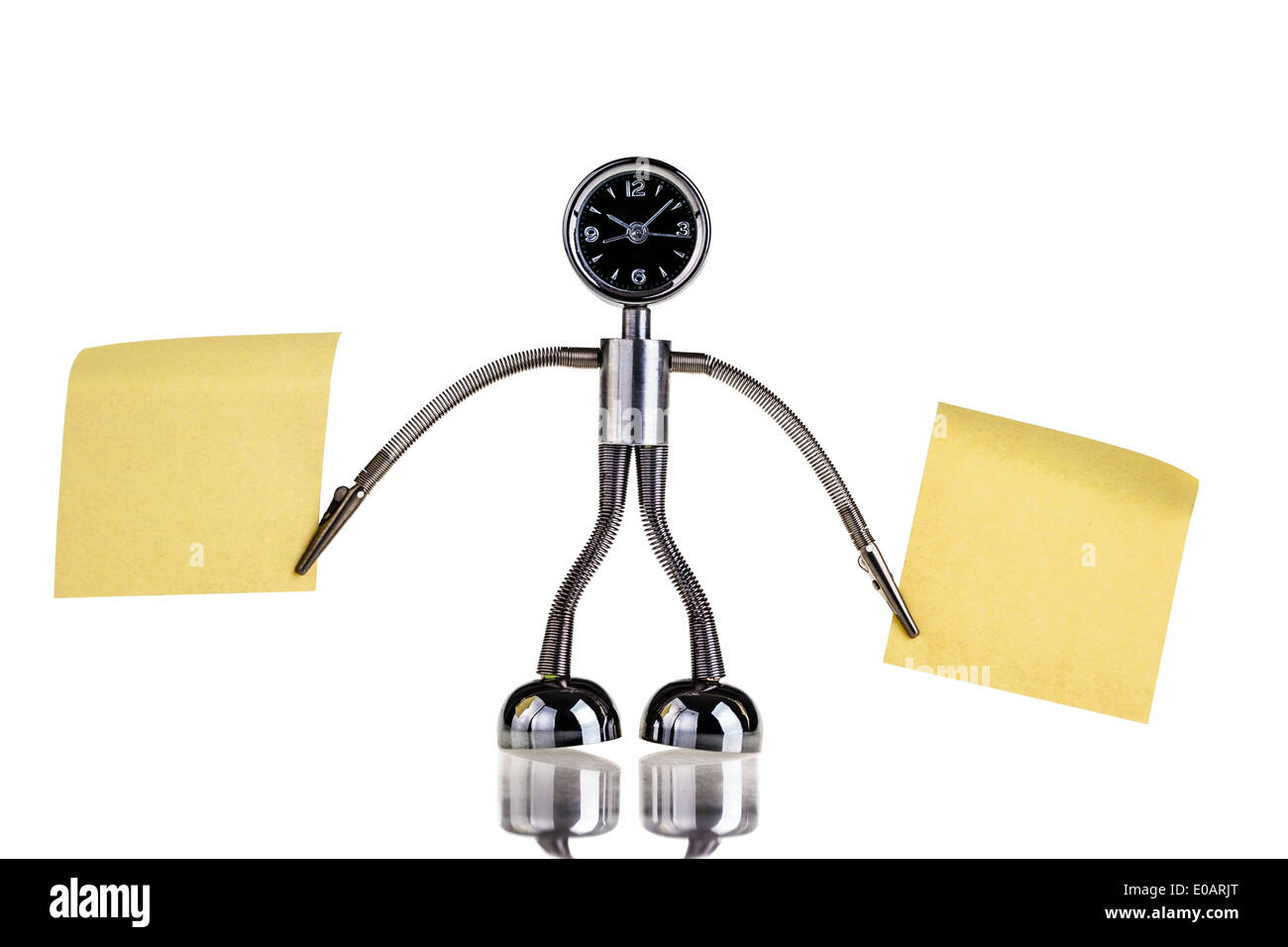 a chrome robot shaped clock isolated over a white background Stock ...