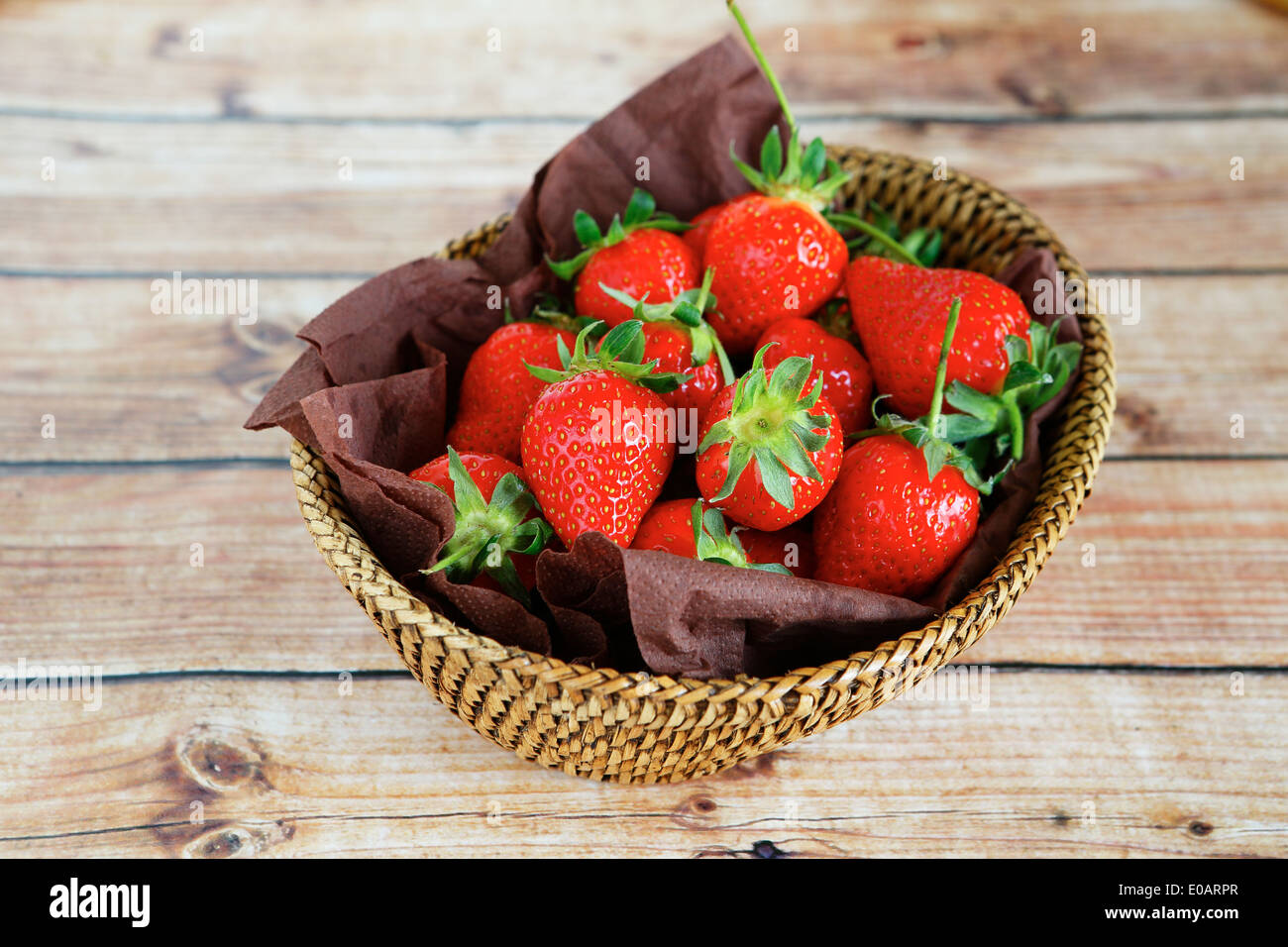 Strawberries in a basket hi-res stock photography and images - Alamy