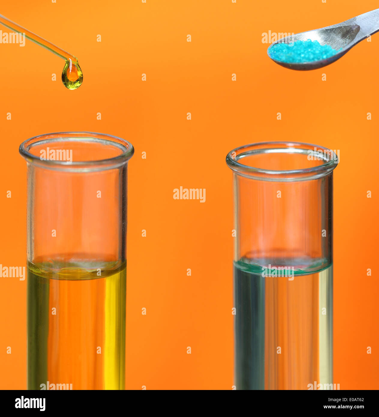 Test tubes with dropper and chemicals Stock Photo - Alamy