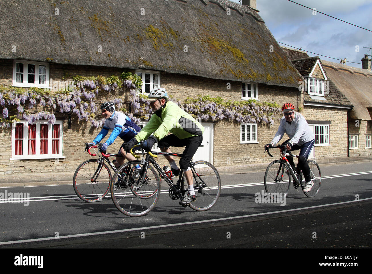 Lower Benefield, Northants, UK. 7th May 2014. Cyclists ride the route ...