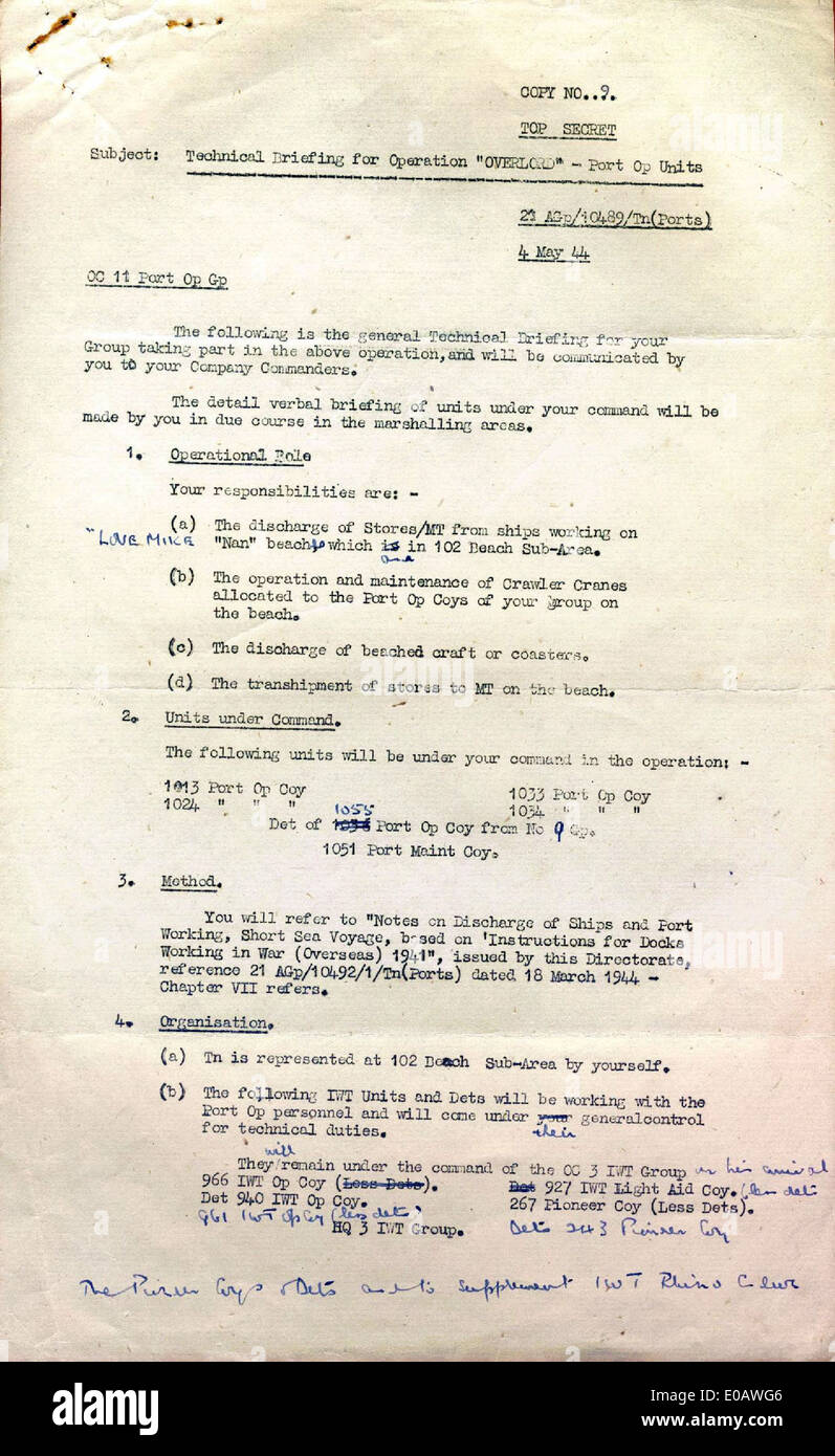 This image captures a technical briefing for D-Day, the Allied invasion ...