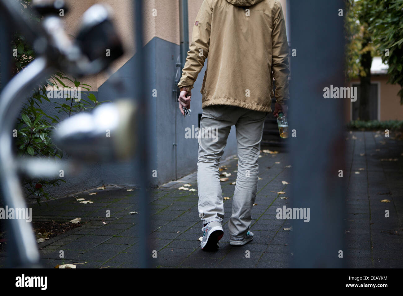 Man coming home from work hi-res stock photography and images - Alamy