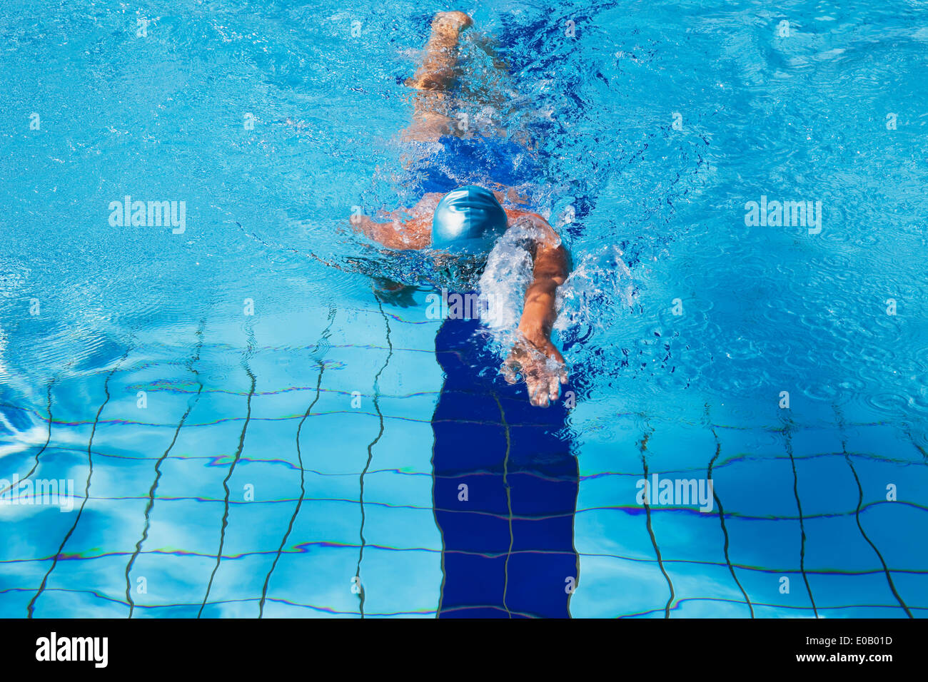 Female swimmer crawling in pool Stock Photo - Alamy