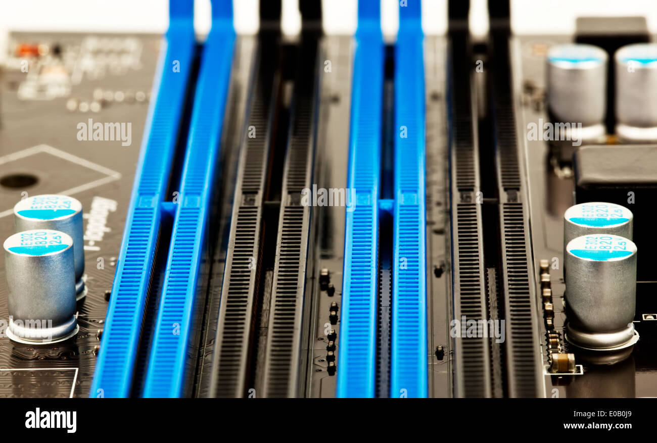 Laptop black and blue mother board parts closeup Stock Photo - Alamy