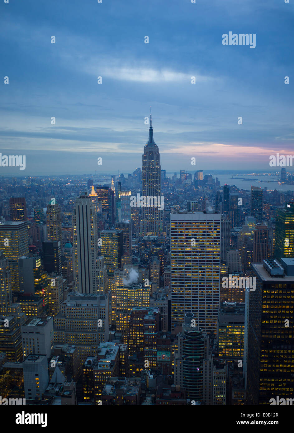 USA, New York, Manhattan, view to lighted skyline at evening twilight ...