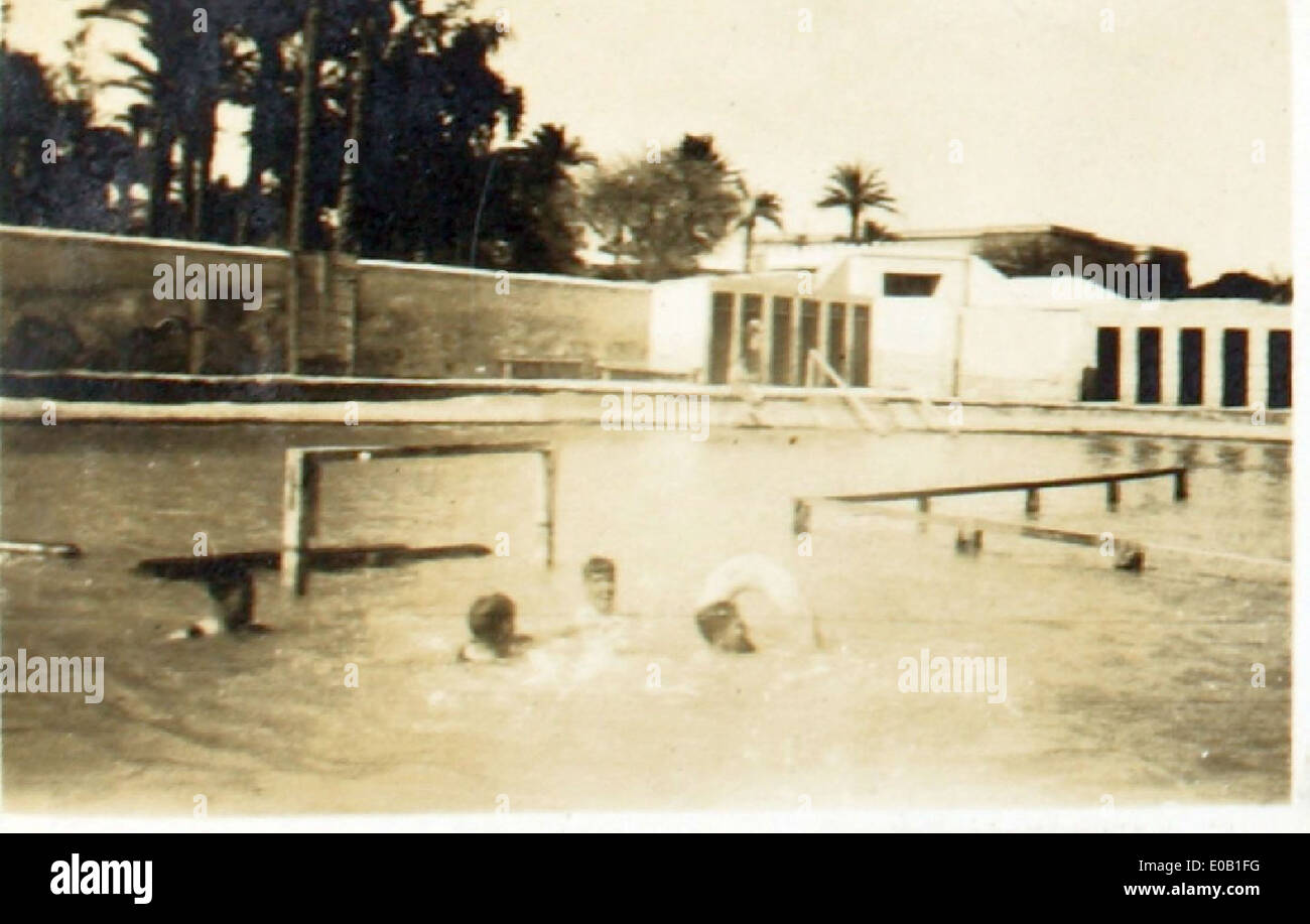 The photograph features the sulphur swimming baths at Helwan, located ...