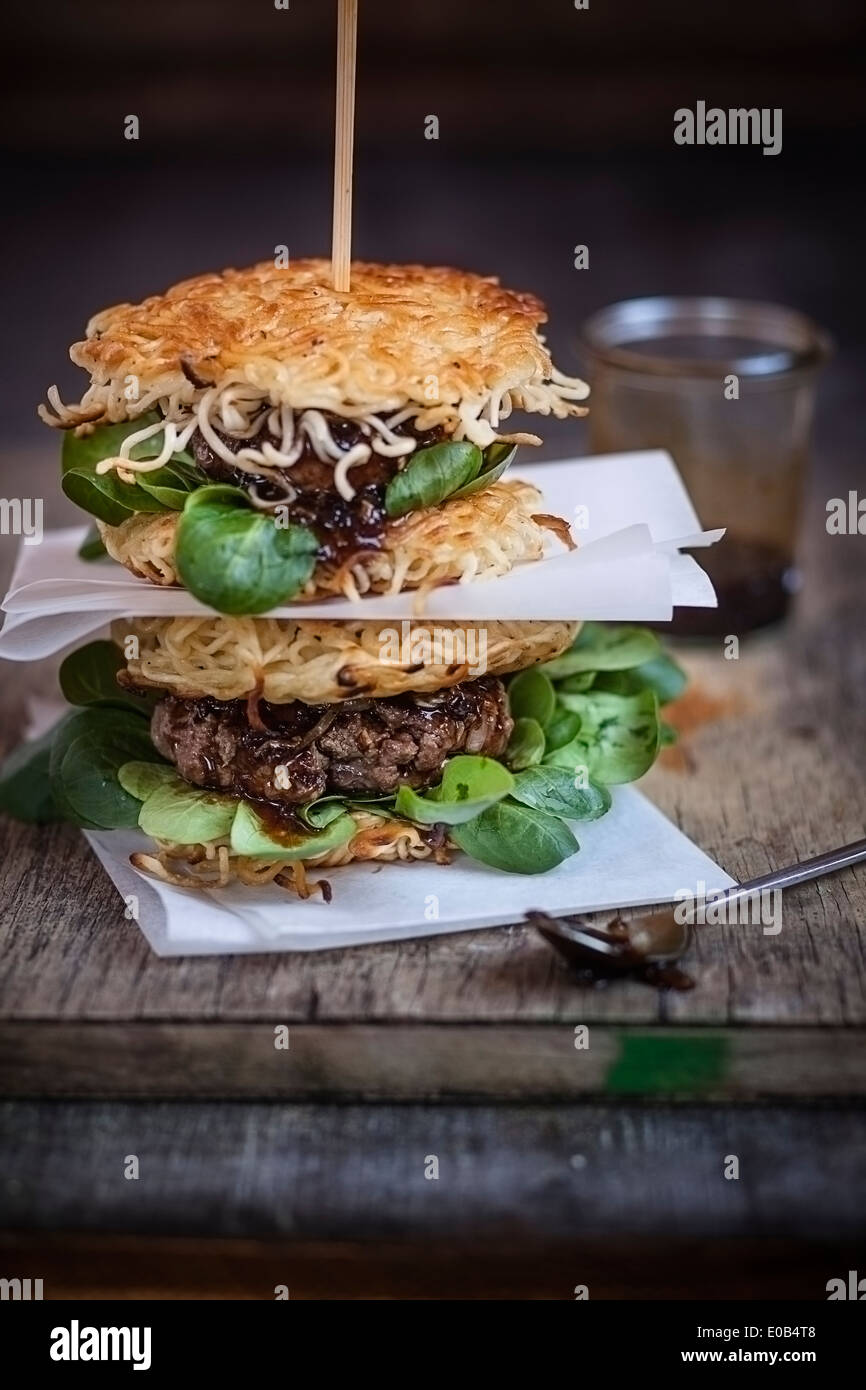 Ramen burgers, with beef patties and lamb's lettuce Stock Photo - Alamy