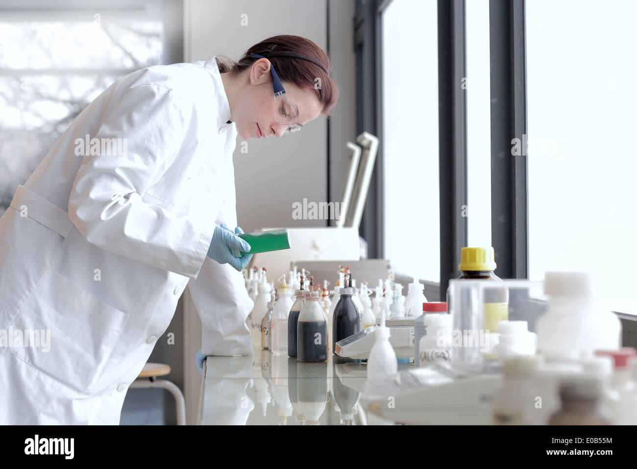 Young female scientist at work in lab Stock Photo - Alamy