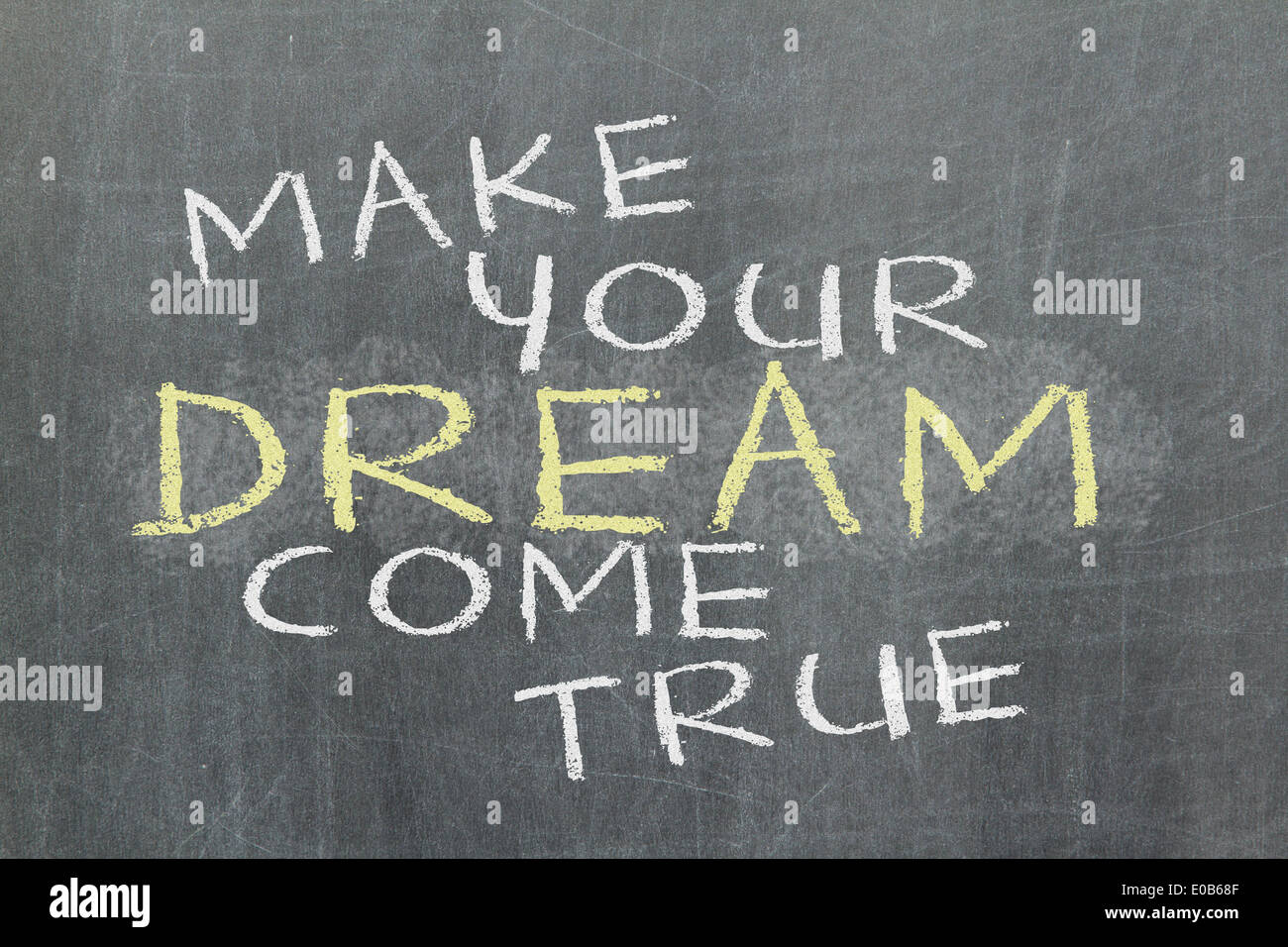 Make your dream come true - motivational slogan handwritten with white ...