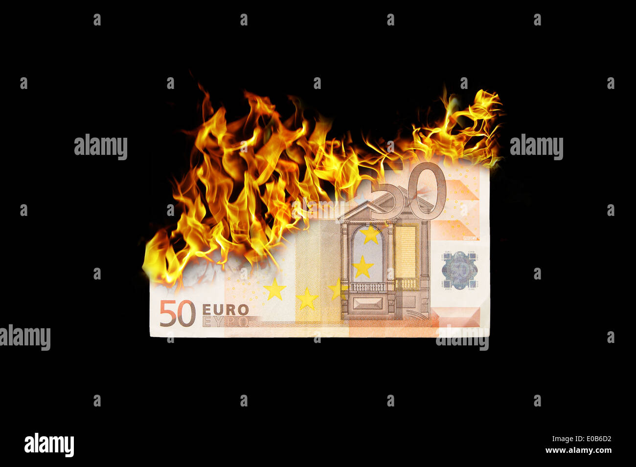 Burning money euro bill on fire isolated on black Stock Photo - Alamy