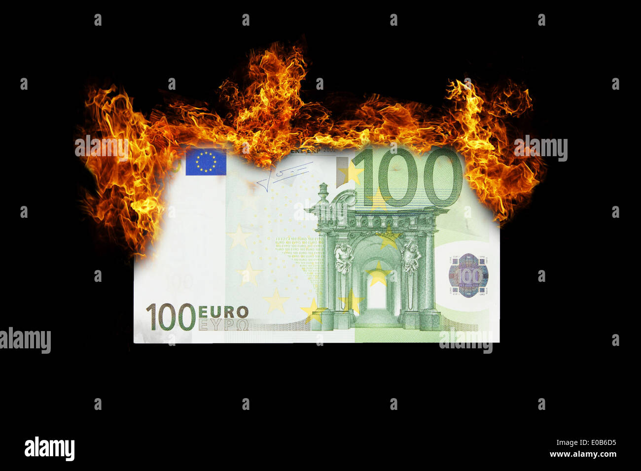 Burning money euro bill on fire isolated on black Stock Photo - Alamy