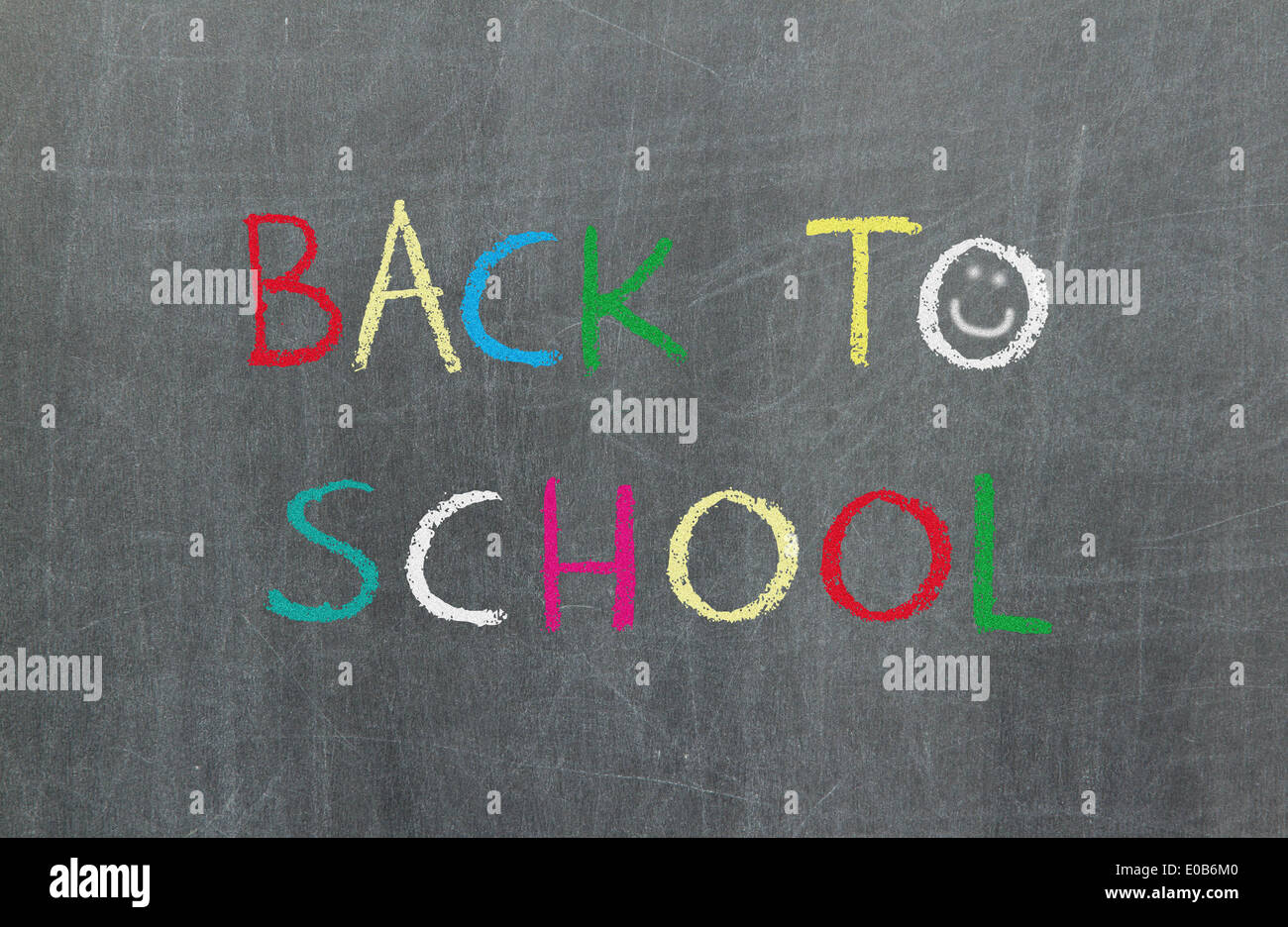 Back to school written on a blackboard Stock Photo - Alamy