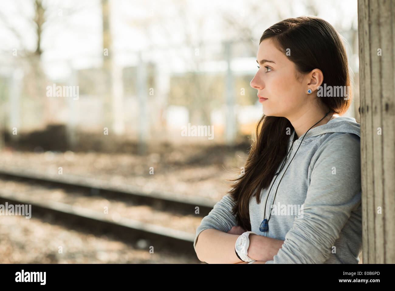 Portrait of waiting teenage girl Stock Photo - Alamy