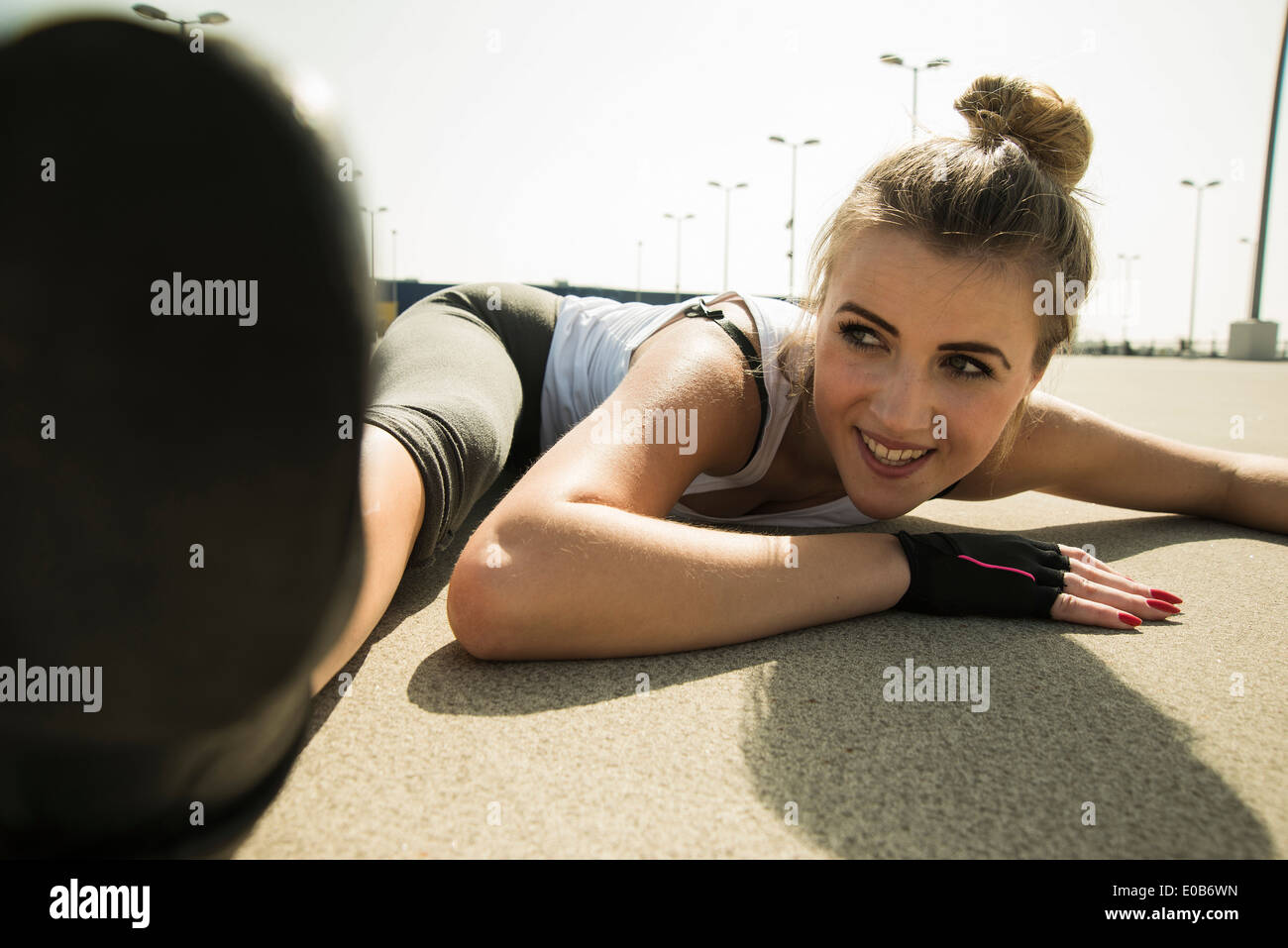 Young woman doing gymnastics outdoors Stock Photo - Alamy