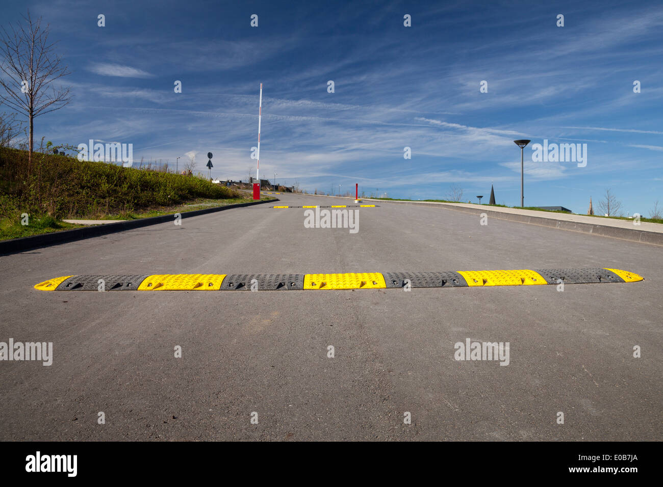 Germany, North Rhine-Westphalia, Street with road hump Stock Photo - Alamy