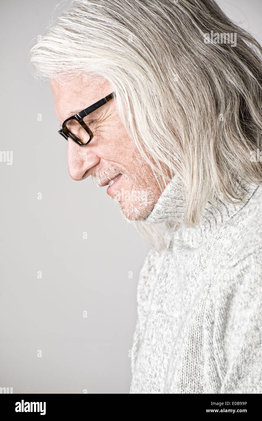 Man profile looking down smiling hi-res stock photography and images ...