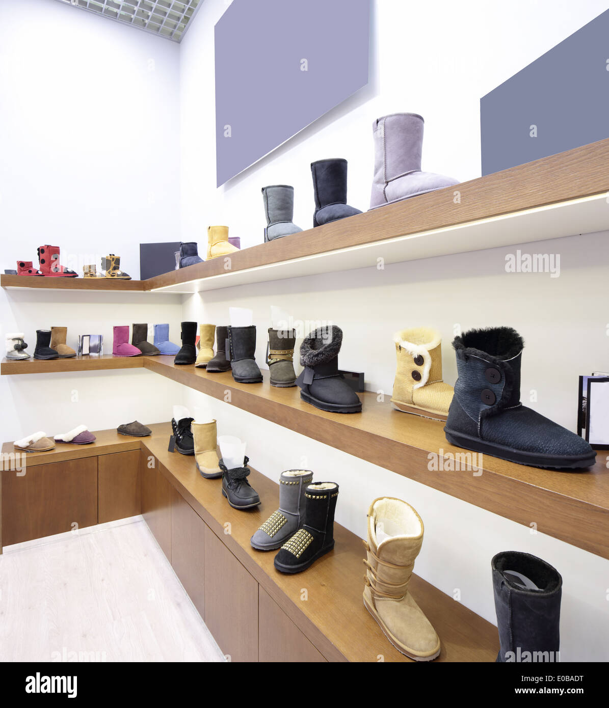 bright and fashionable interior of shoe store in modern mall Stock ...