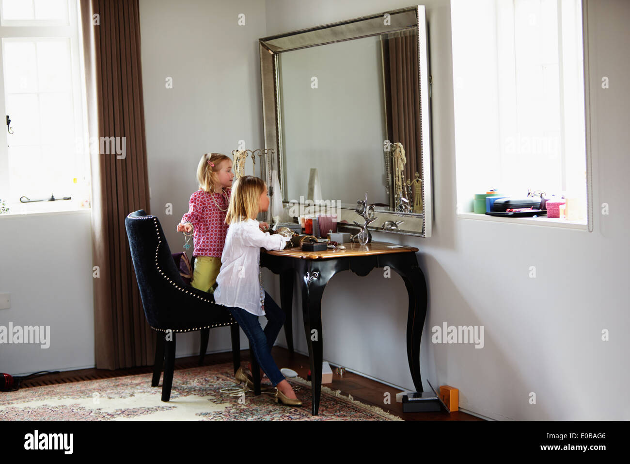 Child dressing up jewelry hi-res stock photography and images - Alamy