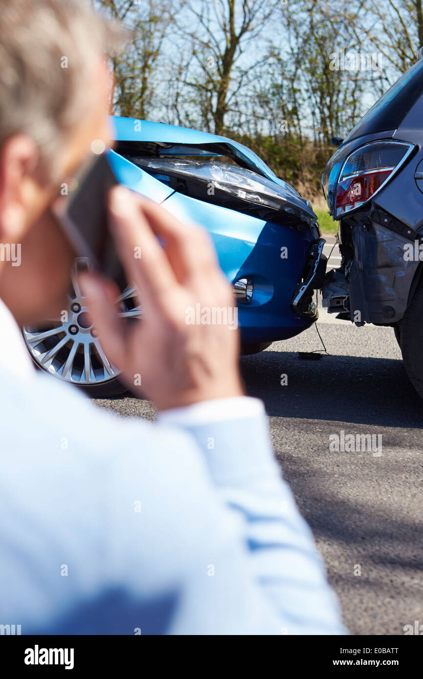 Driver Making Phone Call After Traffic Accident Stock Photo - Alamy