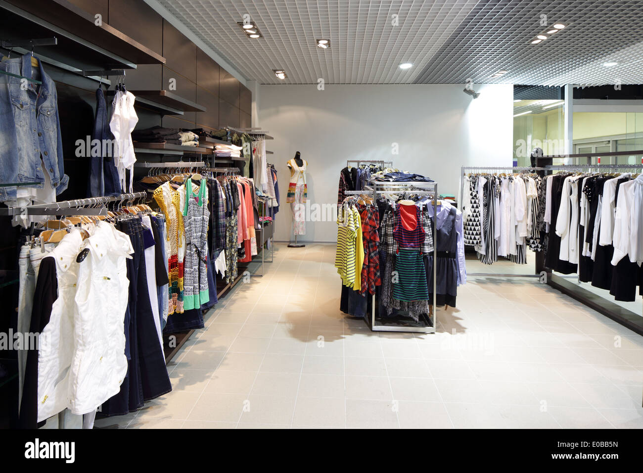 luxury and fashionable brand new interior of cloth store Stock Photo ...