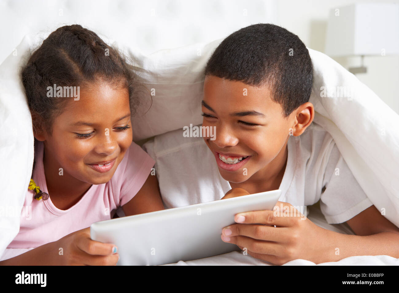 Boy pajamas bed tablet High Resolution Stock Photography and Images - Alamy